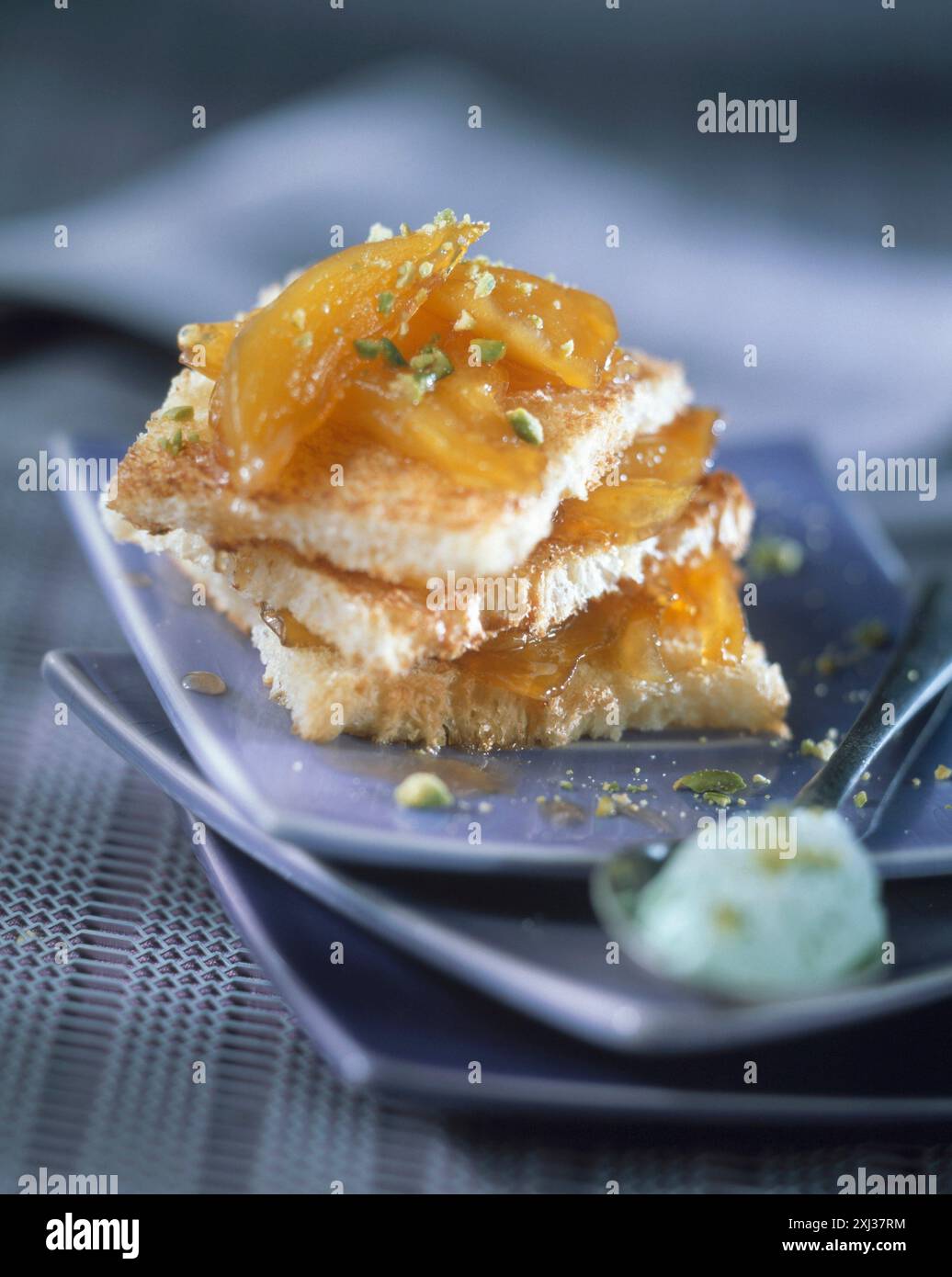 Candied apricots on toast Stock Photo - Alamy
