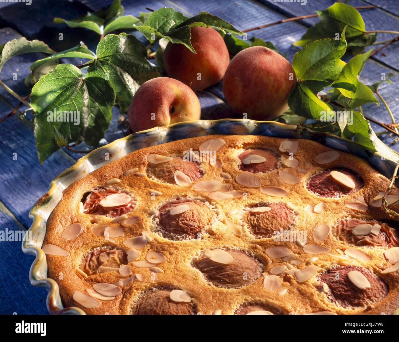 Peach and almond clafoutis Stock Photo - Alamy