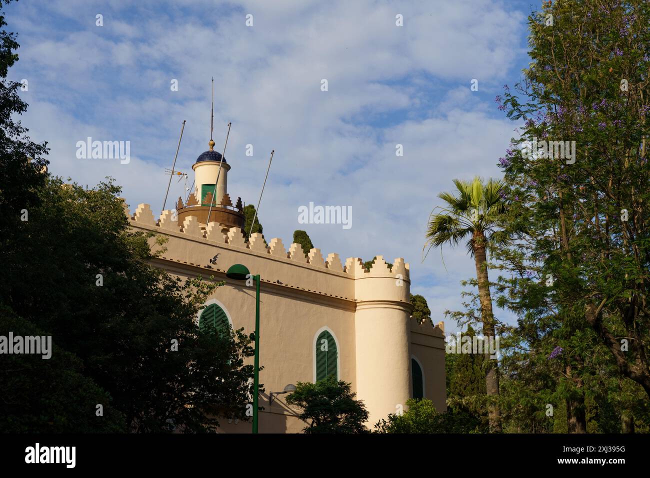Dos Hermanas, Spain - June 1, 2023: A tall, white tower with a ...