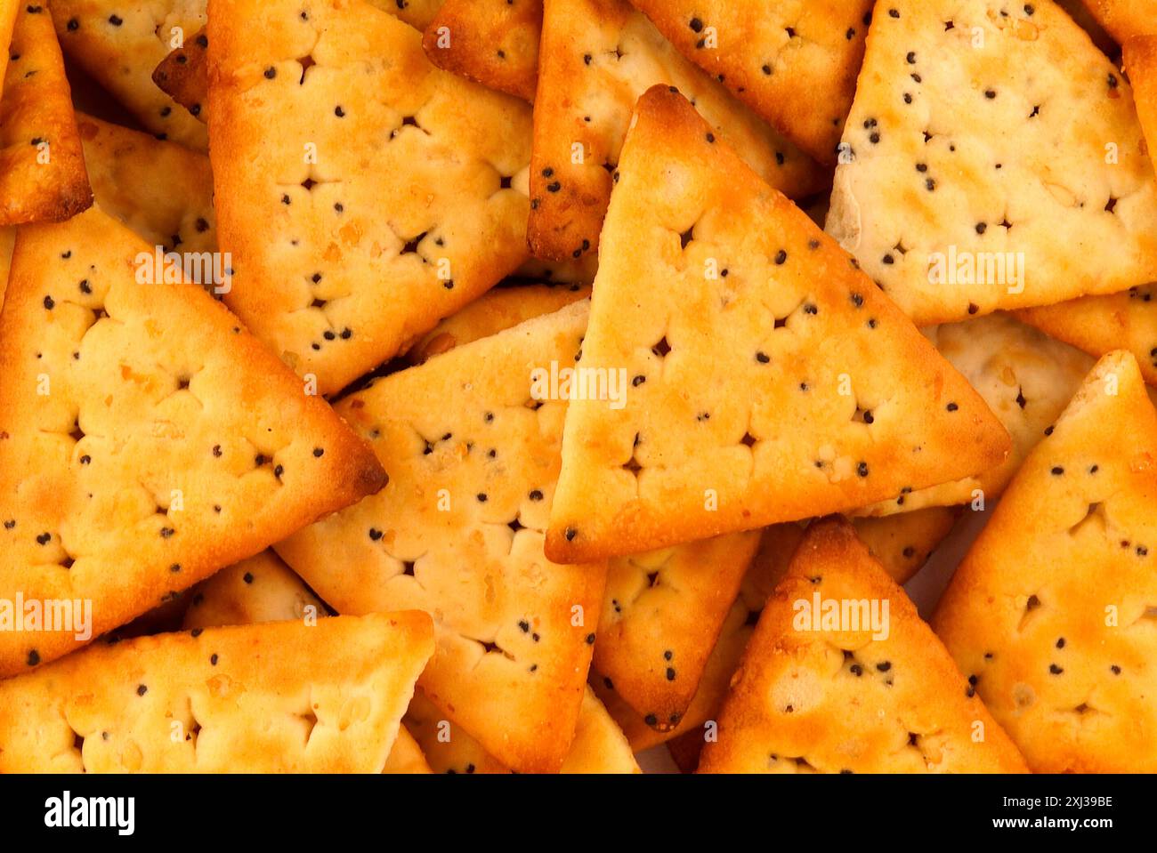 Cumin-flavored aperitif crackers Stock Photo - Alamy