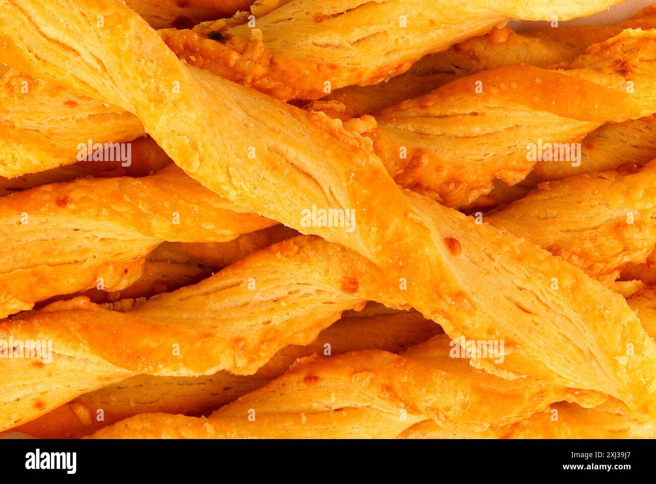Aperitif cheese-flavored pastry twists Stock Photo - Alamy