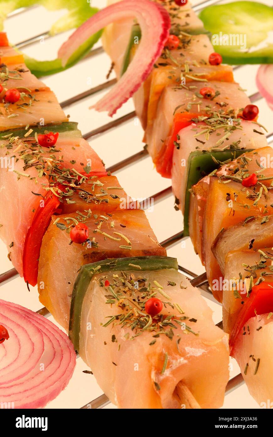 Raw fish brochettes Stock Photo - Alamy