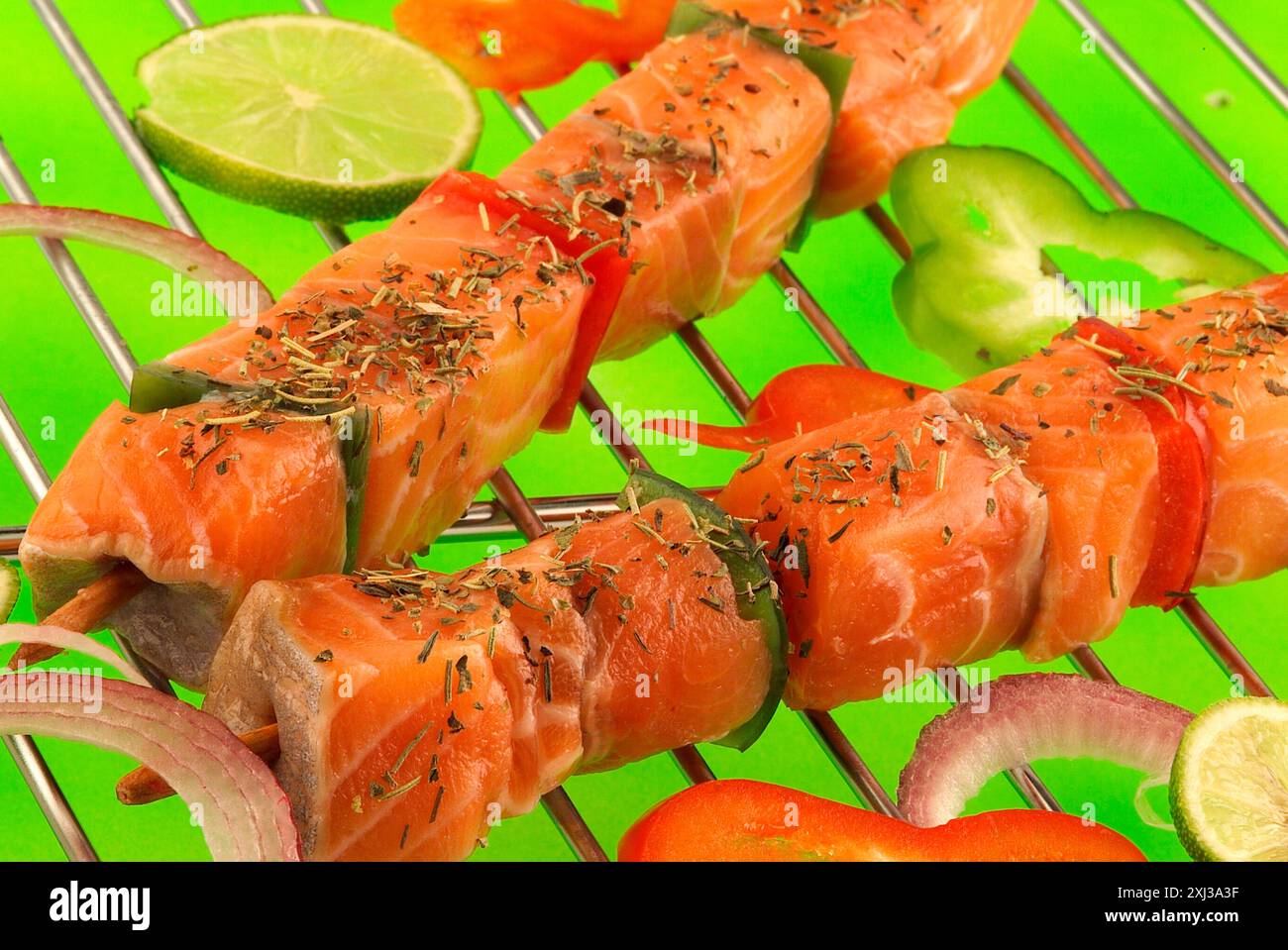 Raw fish brochettes Stock Photo - Alamy