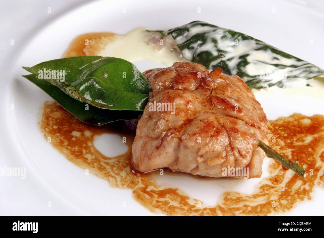 Sweetbreads pricked with bay leaves, stuffed cos leaves Stock Photo - Alamy