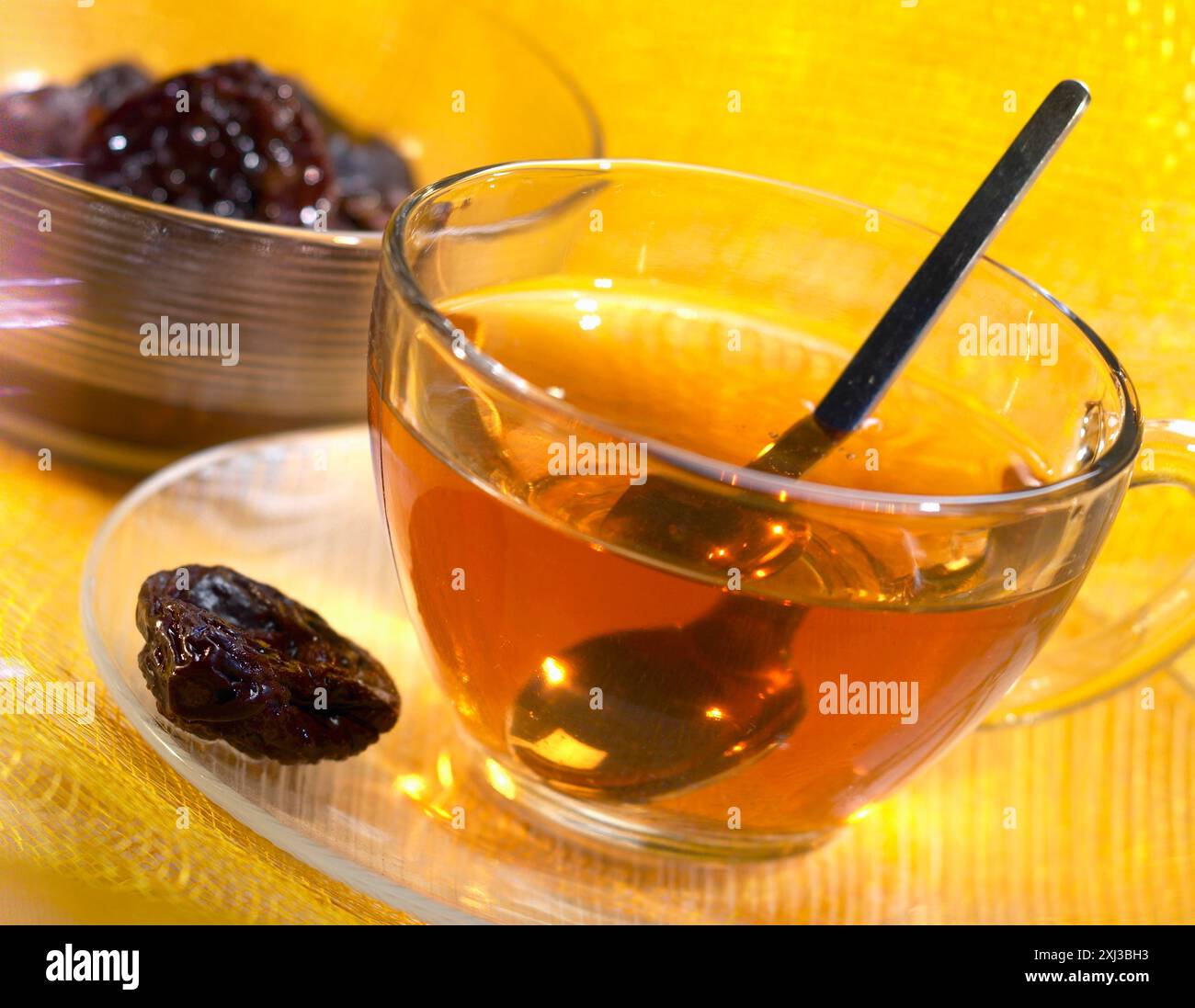 Cup of tea with prunes Stock Photo - Alamy