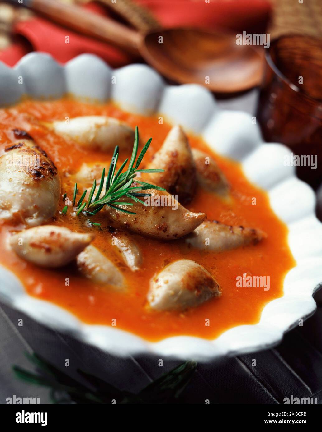 Parmesan stuffed squid soup Stock Photo - Alamy