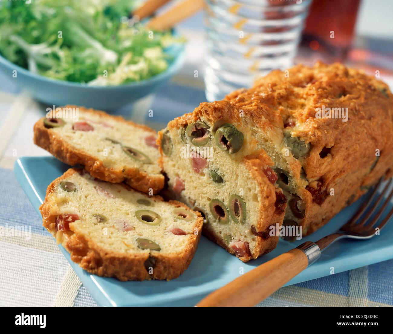Cake with ham and olives (Filmed recipe : final Stock Photo - Alamy