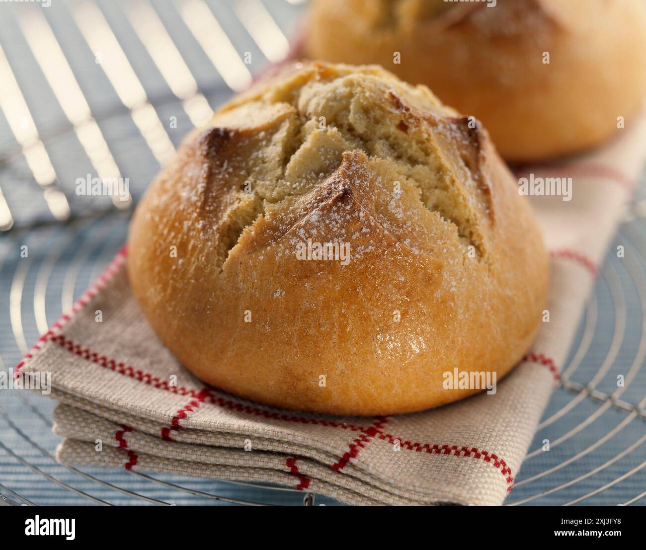 Bread straight from oven (filmed recipe: mouna bread Stock Photo - Alamy