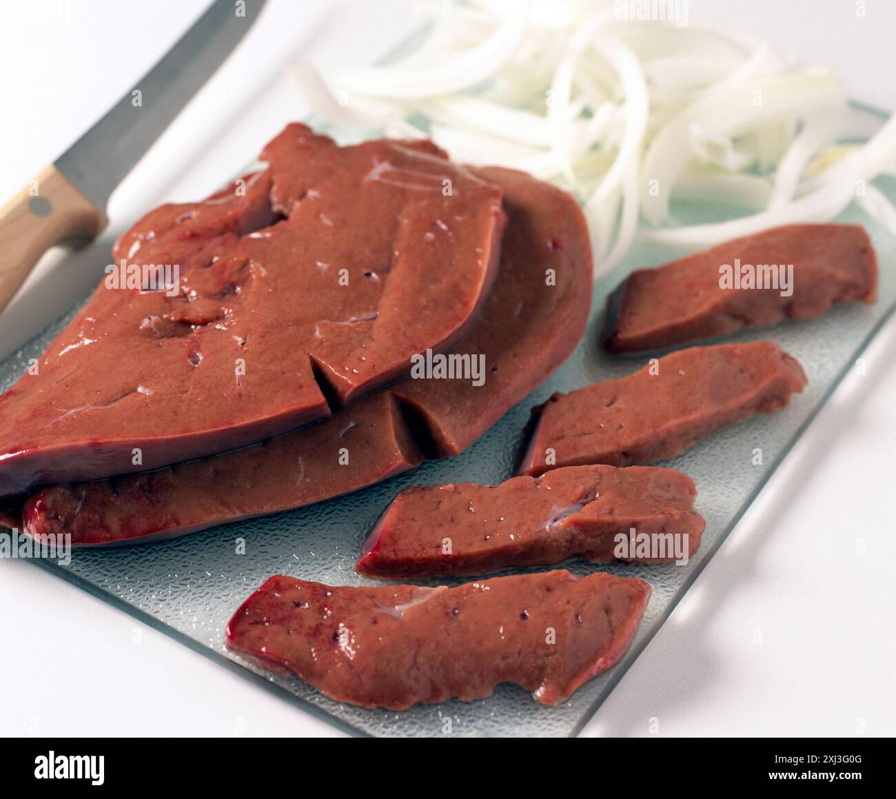 Cutting the liver Stock Photo - Alamy