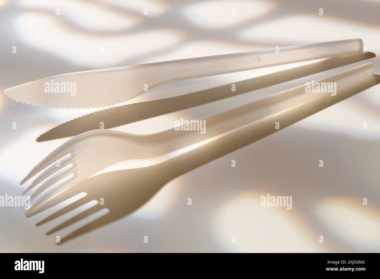Plastic knife and fork Stock Photo - Alamy