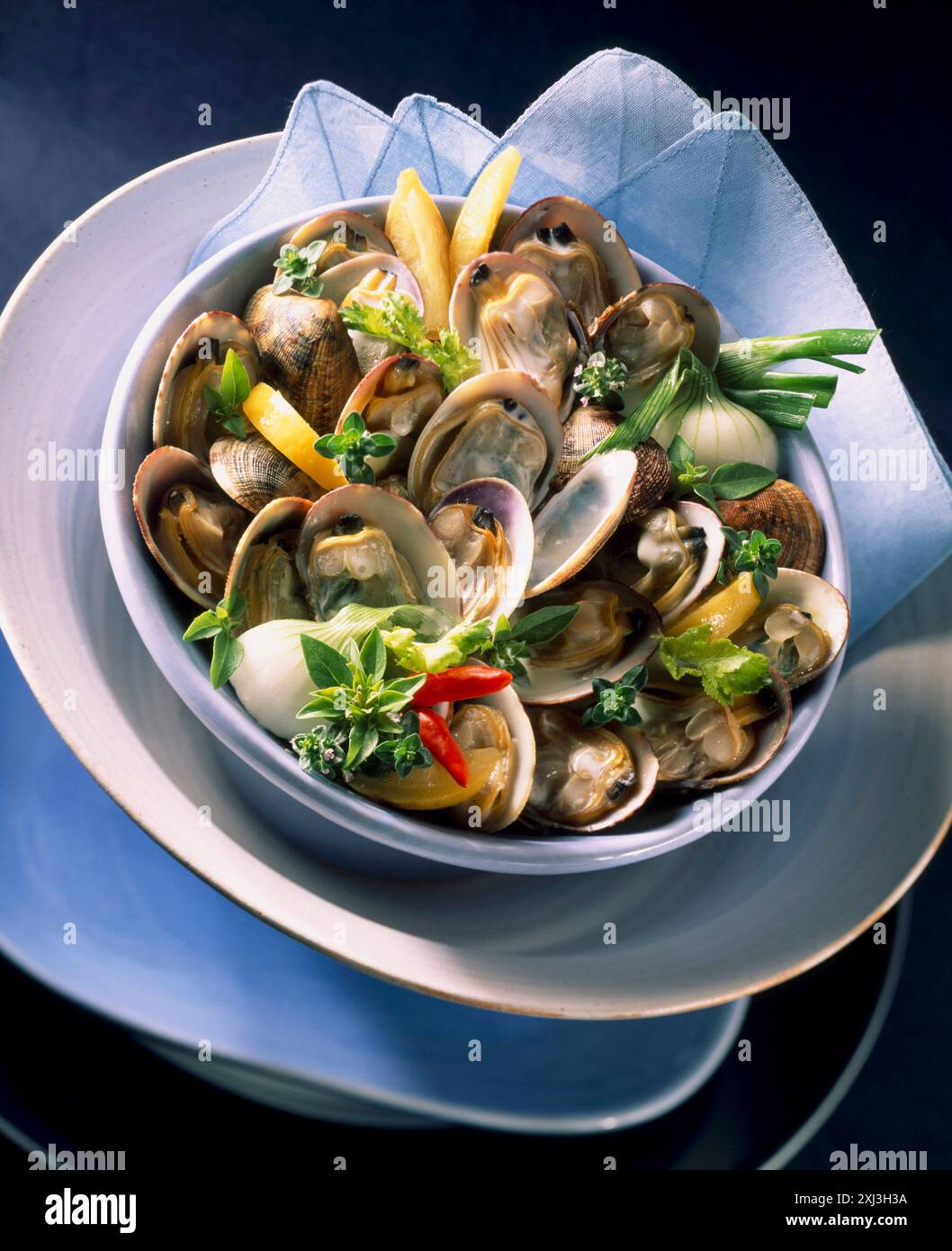 Clam stew with lemon confit Stock Photo - Alamy