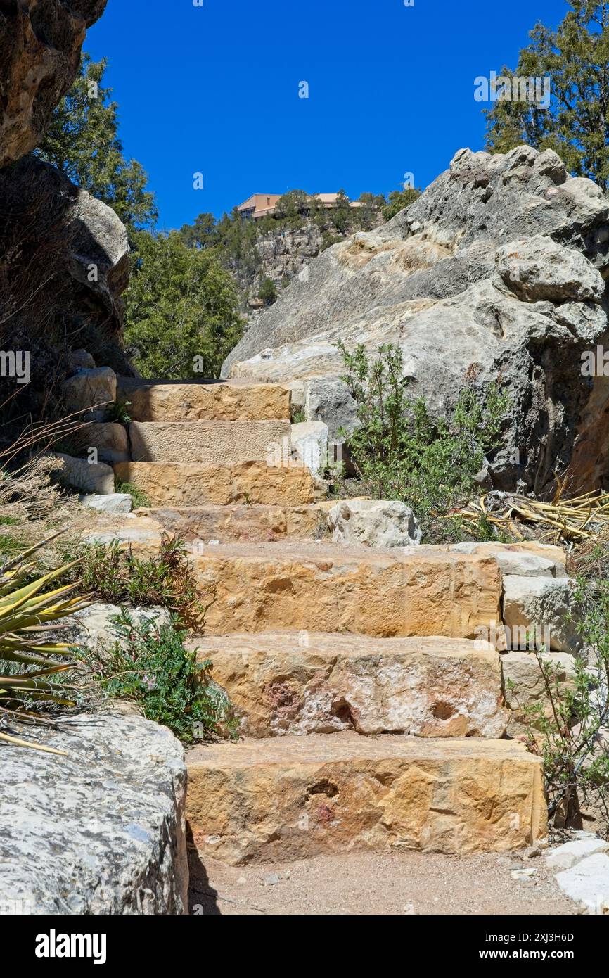 Limestone block steps along Island Trail with distant visitor center at ...