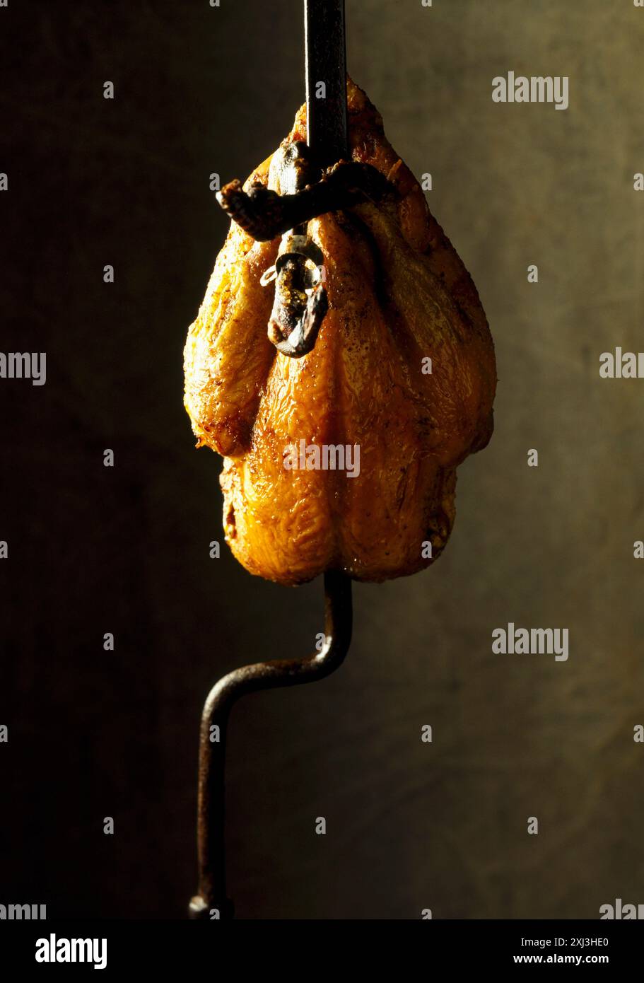 Chicken on the spit Stock Photo - Alamy