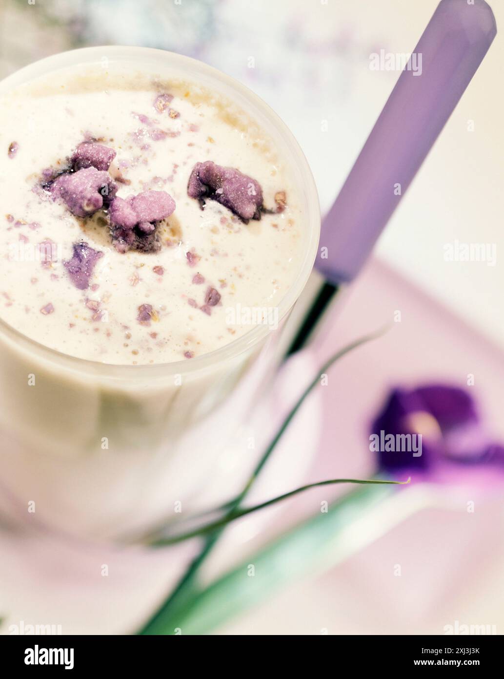 Violet-flavored milk shake Stock Photo - Alamy