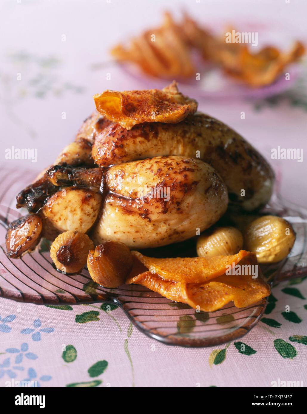 young cockerel roasted with honey and 4 spices,sweet potato chips Stock ...