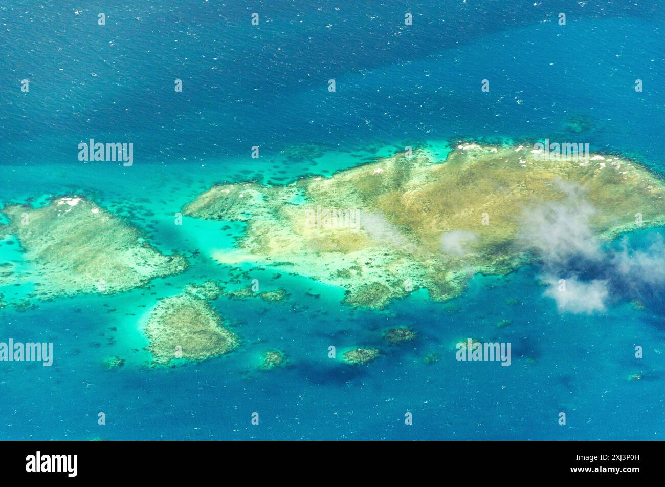 Aerial view on Great Barrier Reef on the way from Cairns to Lizard ...