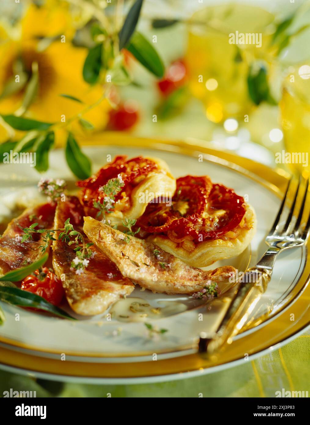 Red mullet fillets with tomato and thyme flower tatain tart Stock Photo ...