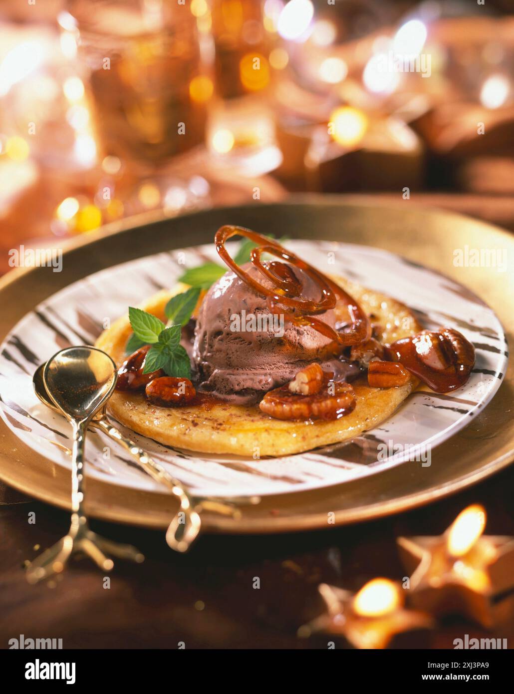 warm chocolate blinis, caramelized pecan nuts Stock Photo - Alamy