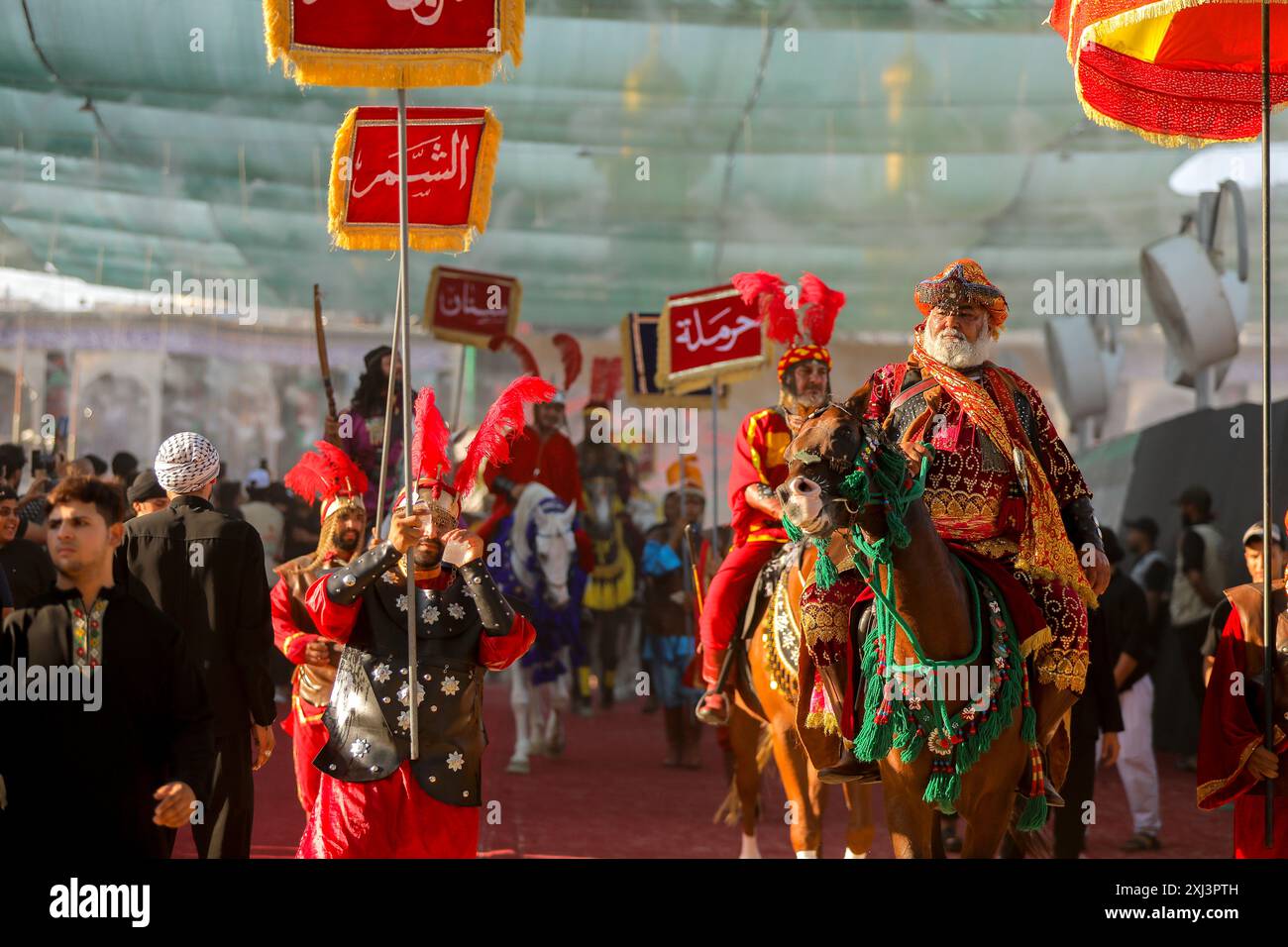 Iraqi Shiites mark the month of Muharram in Karbala, Iraq, on Tuesday ...
