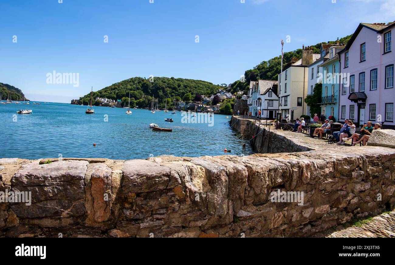 Bayard's cove Dartmouth Devon with colorful houses, people sitting by ...