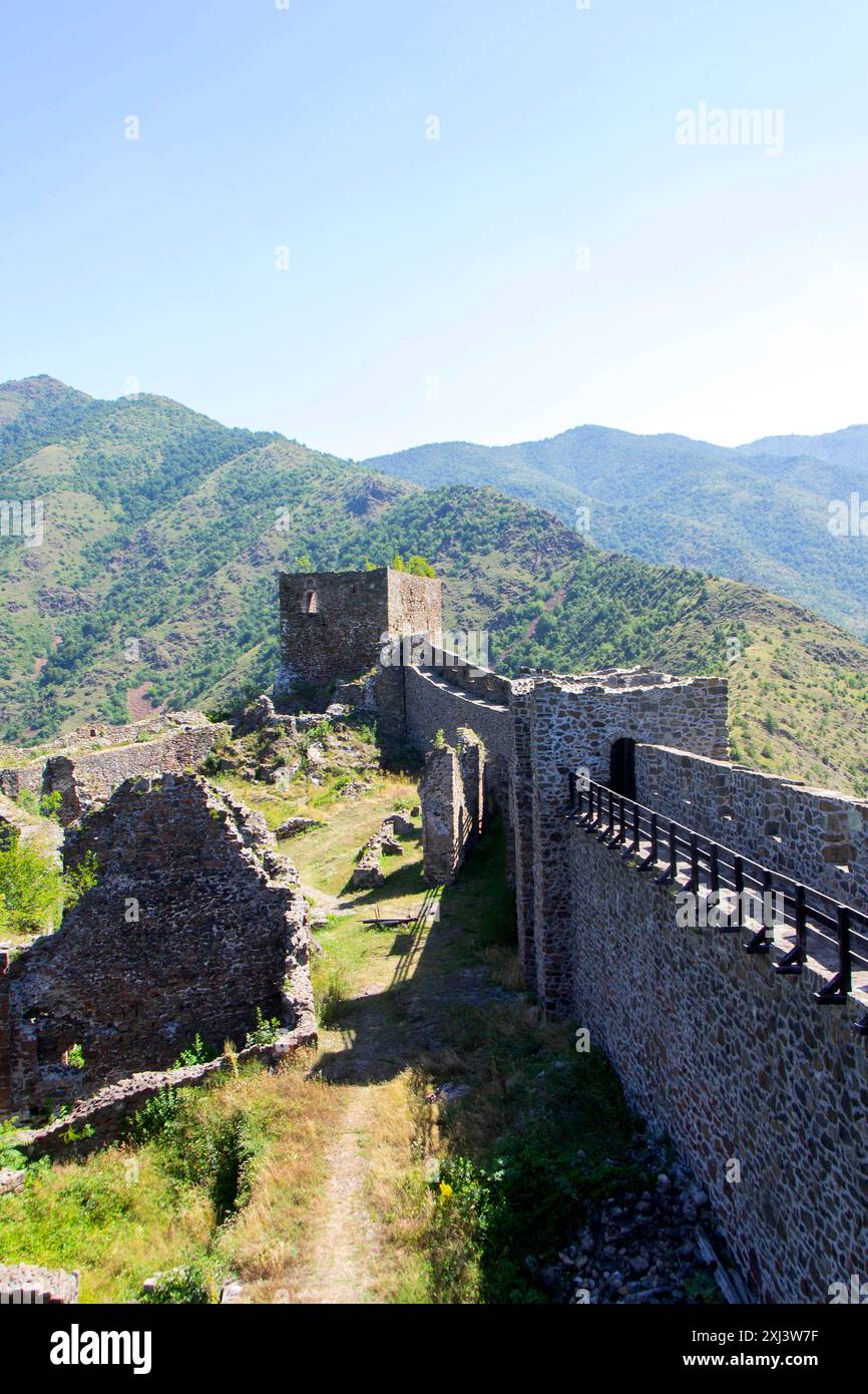 Maglič Fortress, a stunning medieval stronghold in Serbia, perches atop ...