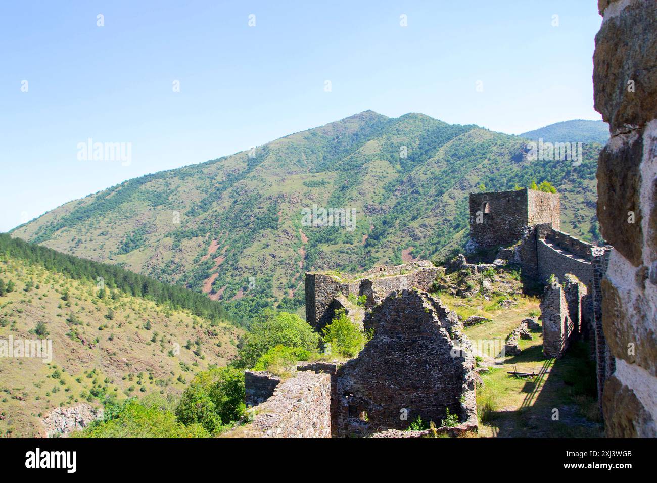 Maglič Fortress, a stunning medieval stronghold in Serbia, perches atop ...