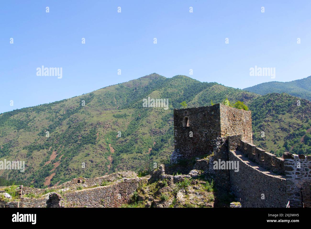 Maglič Fortress, a stunning medieval stronghold in Serbia, perches atop ...