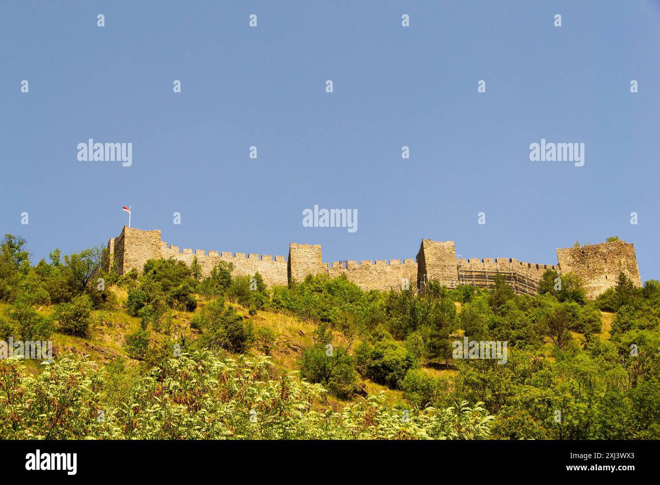Maglič Fortress, a stunning medieval stronghold in Serbia, perches atop ...