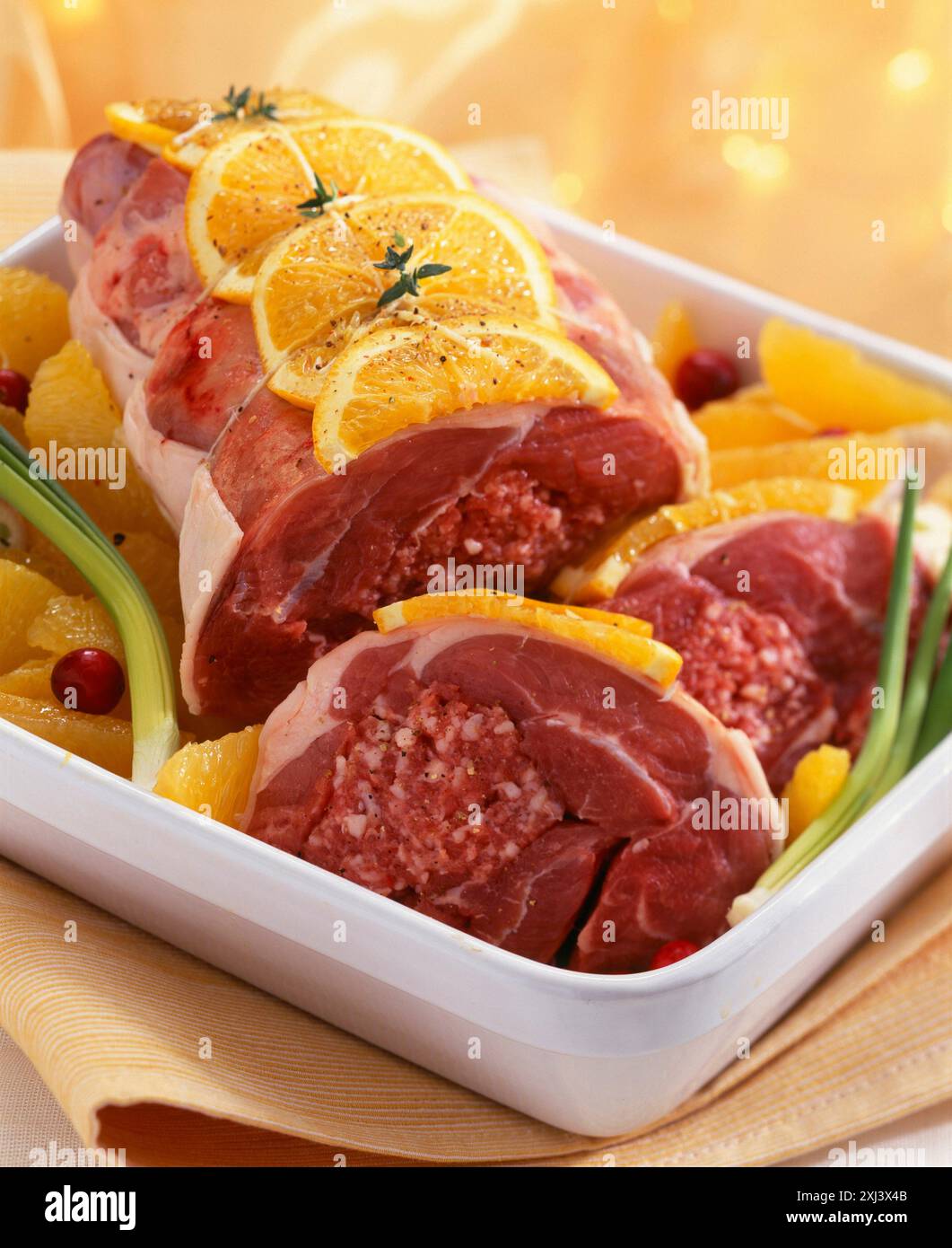 Stuffed roast pork ready to be cooked Stock Photo - Alamy