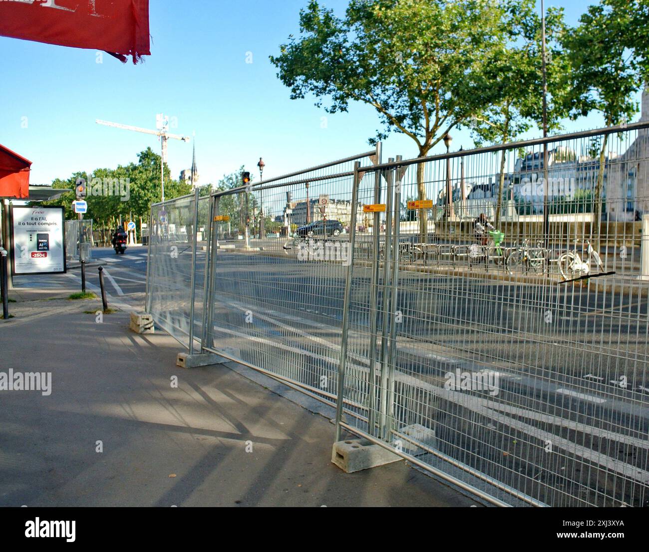Paris, France. 16th July, 2024. Fences are is installed in nearby ...