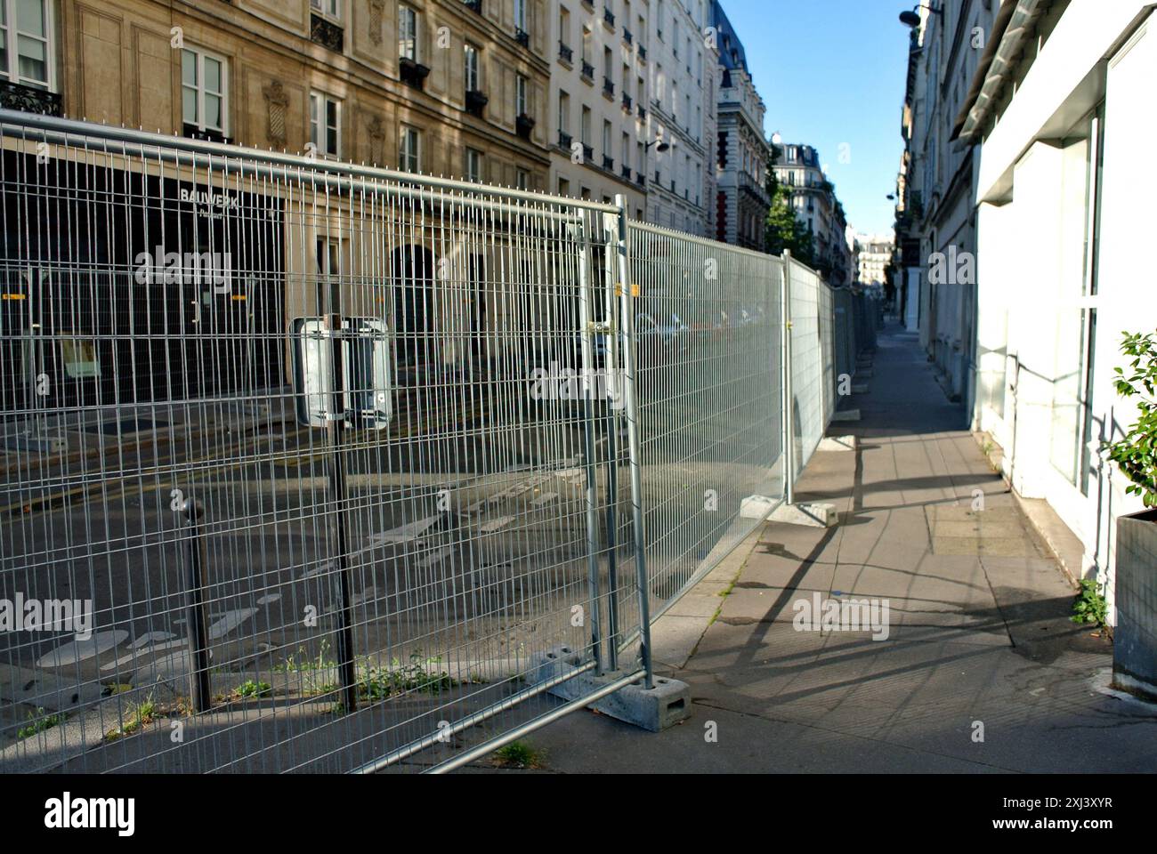 Paris, France. 16th July, 2024. Fences are is installed in nearby ...