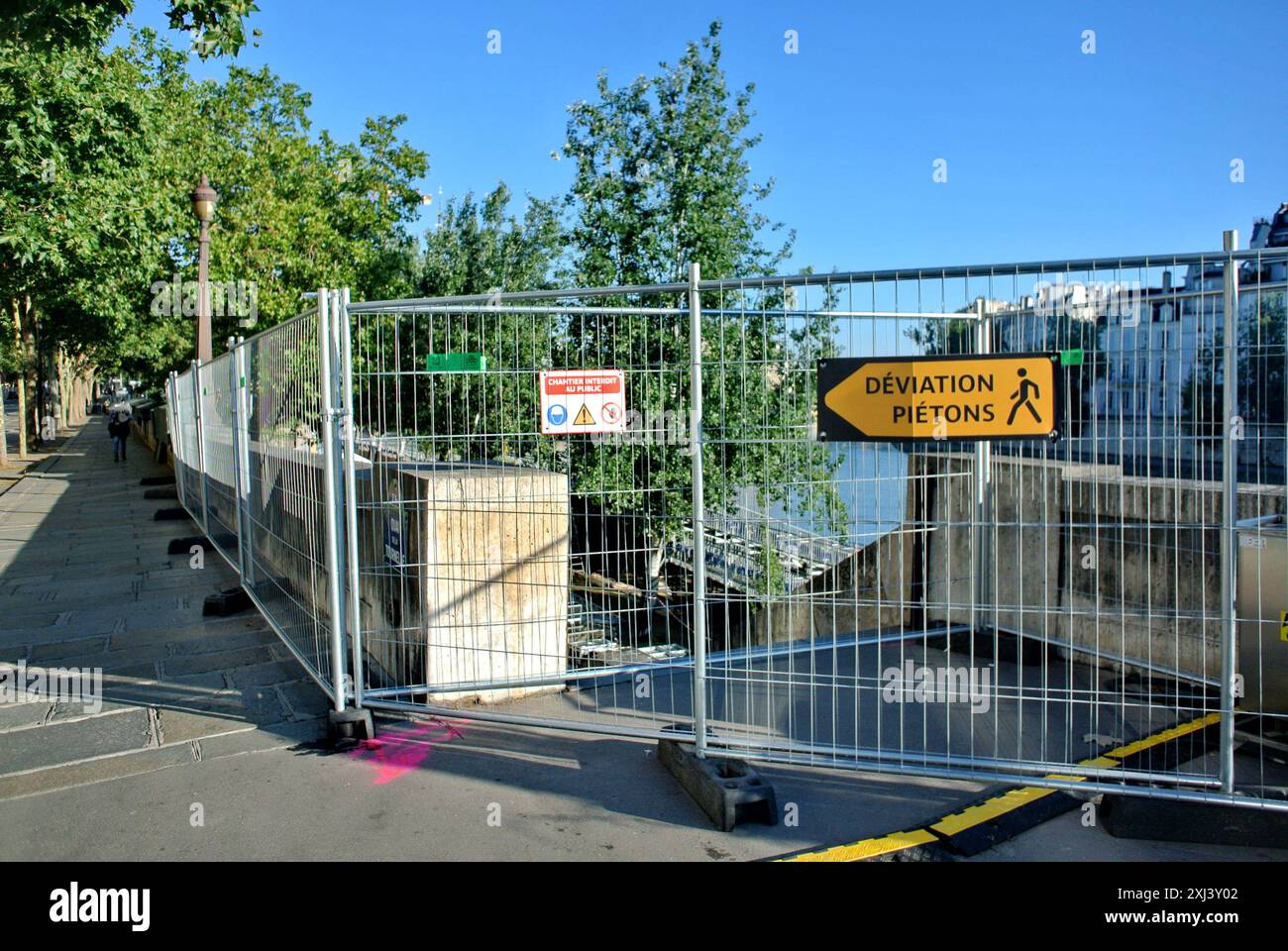 Paris, France. 16th July, 2024. Fences are is installed in nearby ...