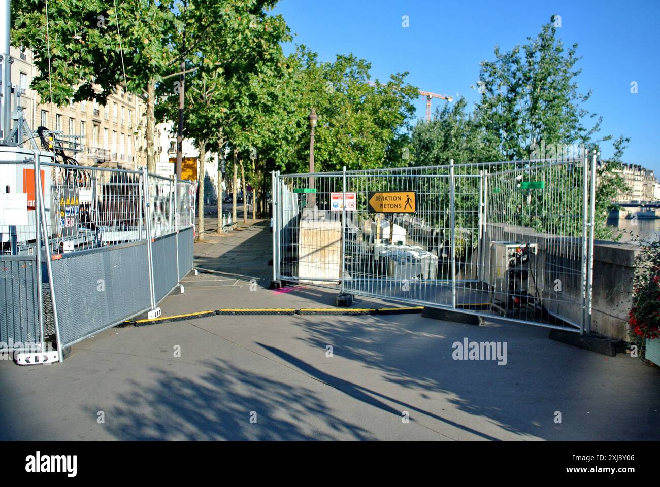 Paris, France. 16th July, 2024. Fences are is installed in nearby ...