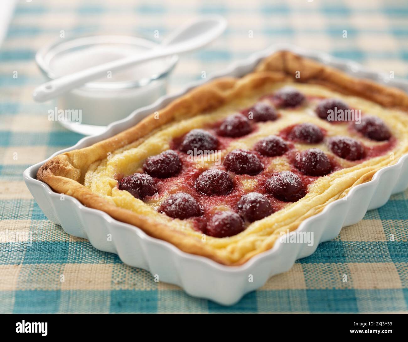 cherry clafoutis batter pudding (step by step: final Stock Photo - Alamy