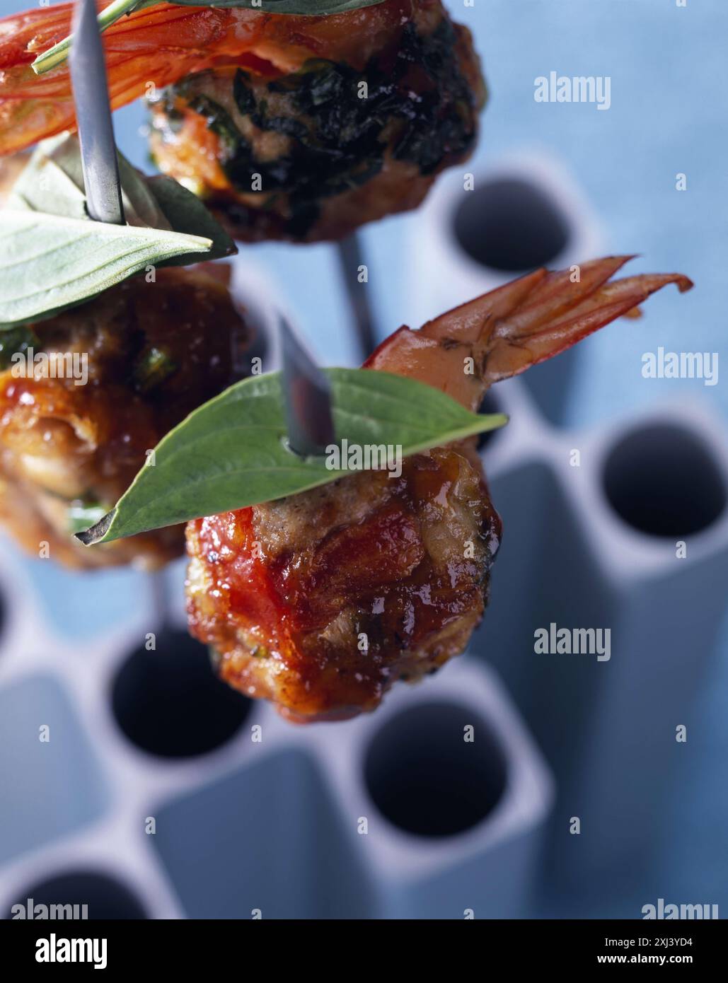 Pork and shrimp brochettes Stock Photo - Alamy