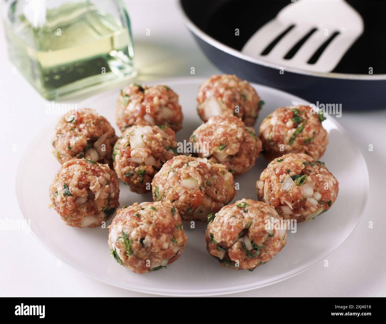 Shaping the meatballs Stock Photo - Alamy