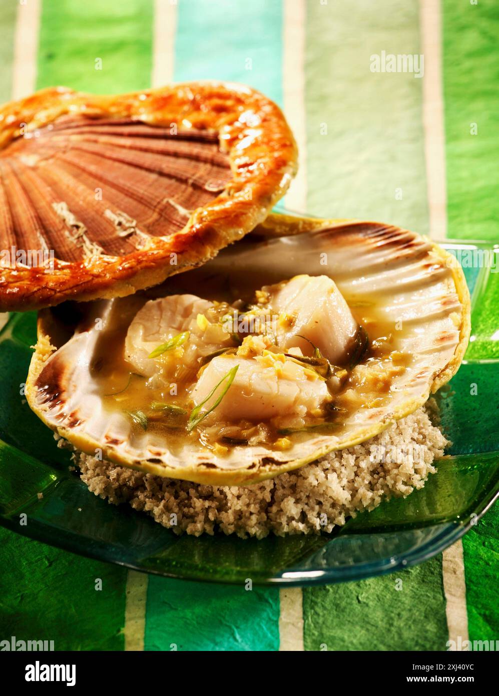 Scallops with ginger sealed with pastry and cooked in the oven Stock ...