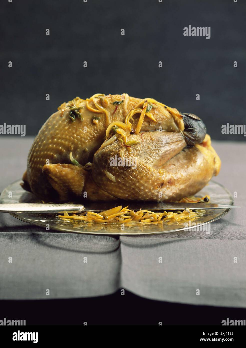 Roast guinea-fowl with spices Stock Photo - Alamy