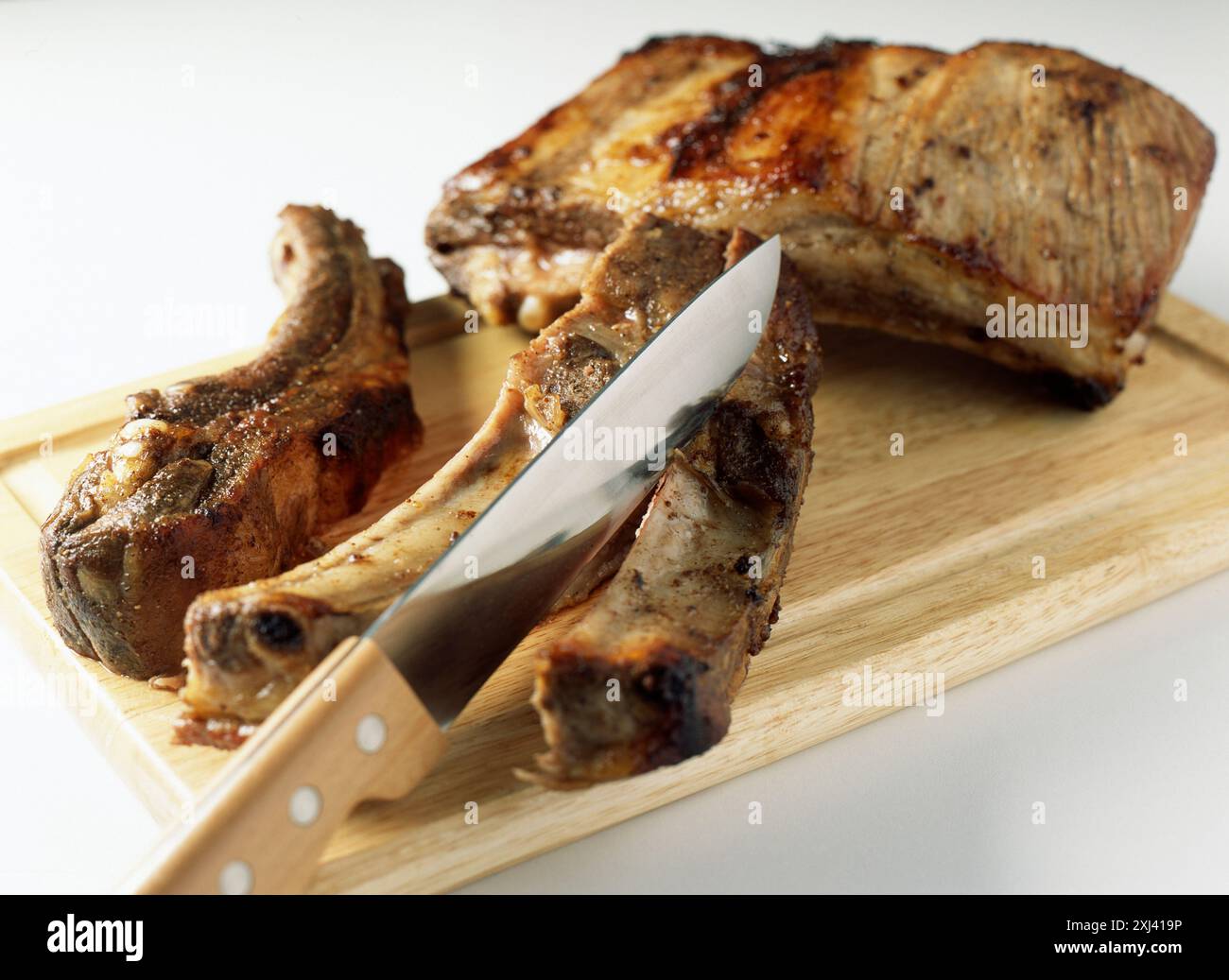 cutting up spare ribs (filmed recipe: pork spare ribs marinated in ...