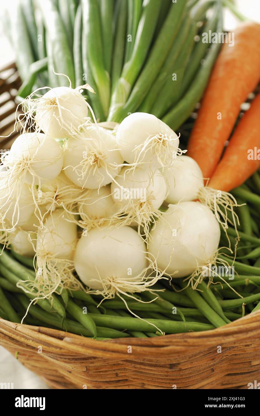 Basket of green beans and spring onions Stock Photo - Alamy