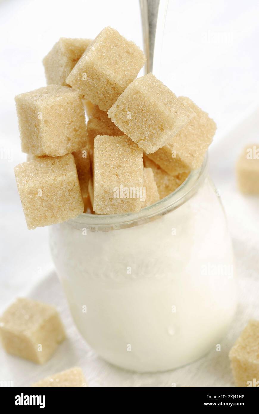 squares of brown sugar in a plain yoghurt Stock Photo - Alamy