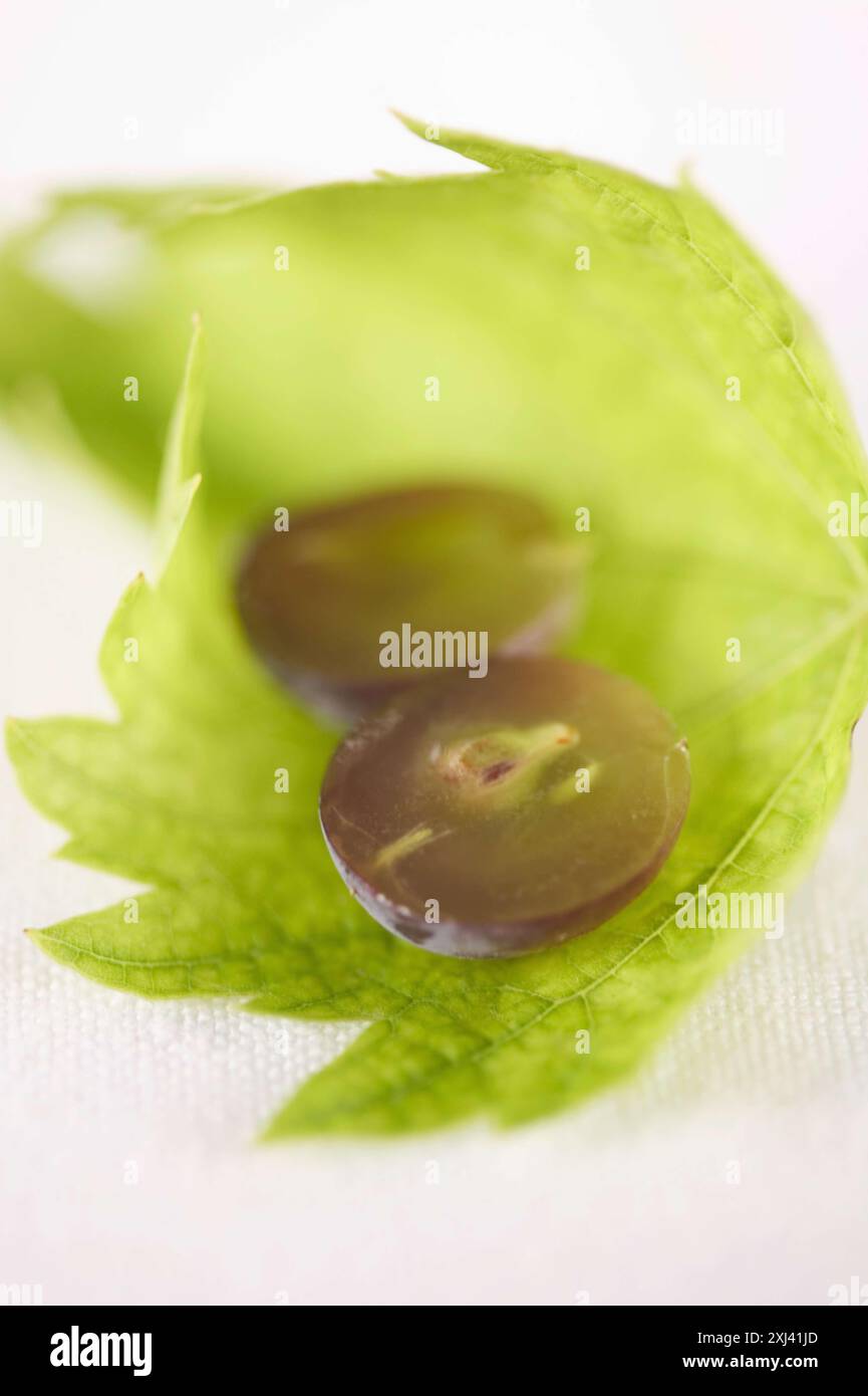 Grape cut in half Stock Photo - Alamy