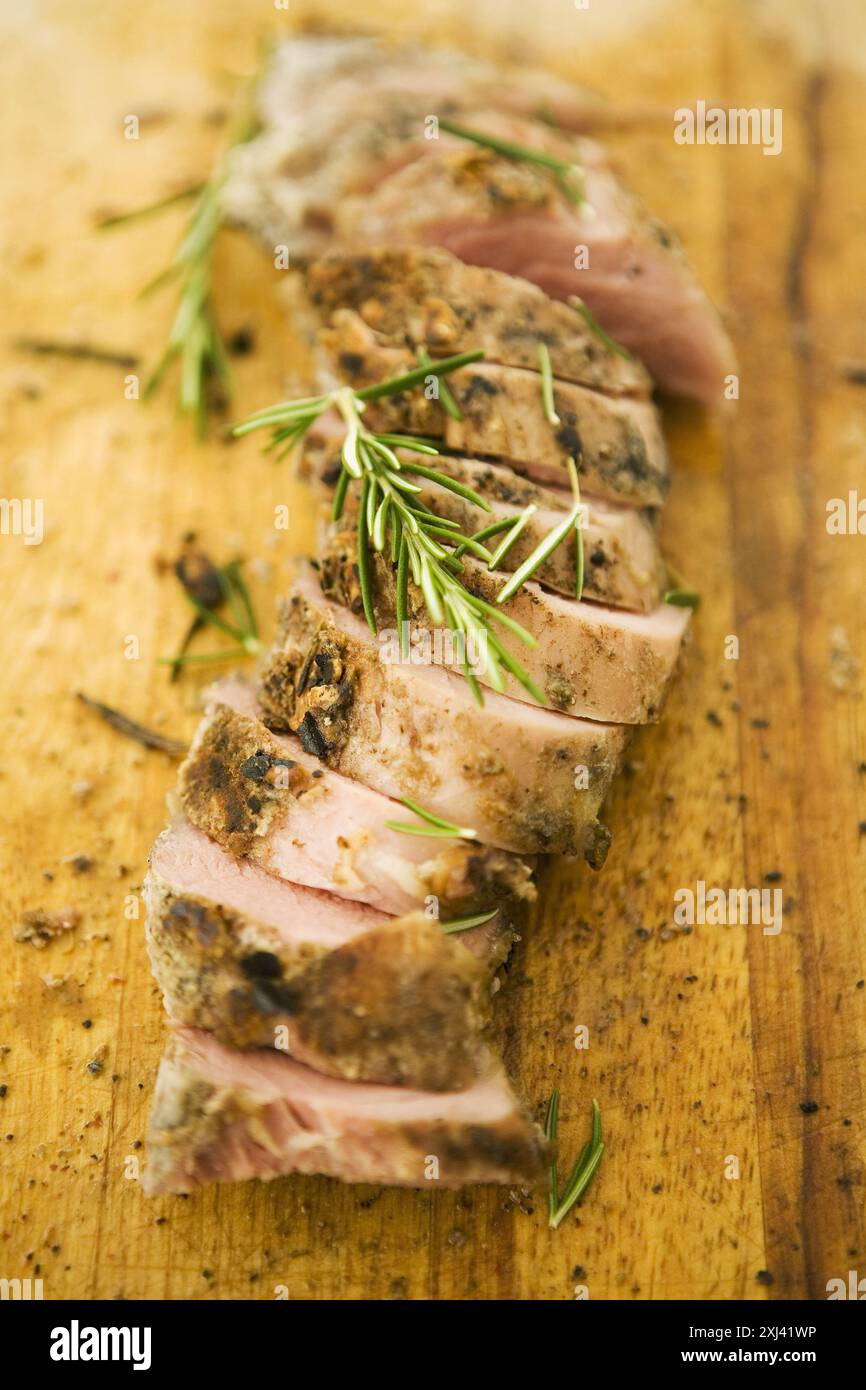 Sliced filet mignon on a chopping board Stock Photo - Alamy