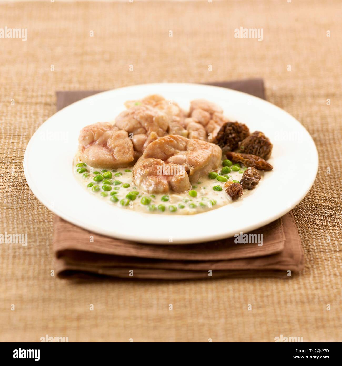 Sweetbreads in creamy sauce Stock Photo - Alamy