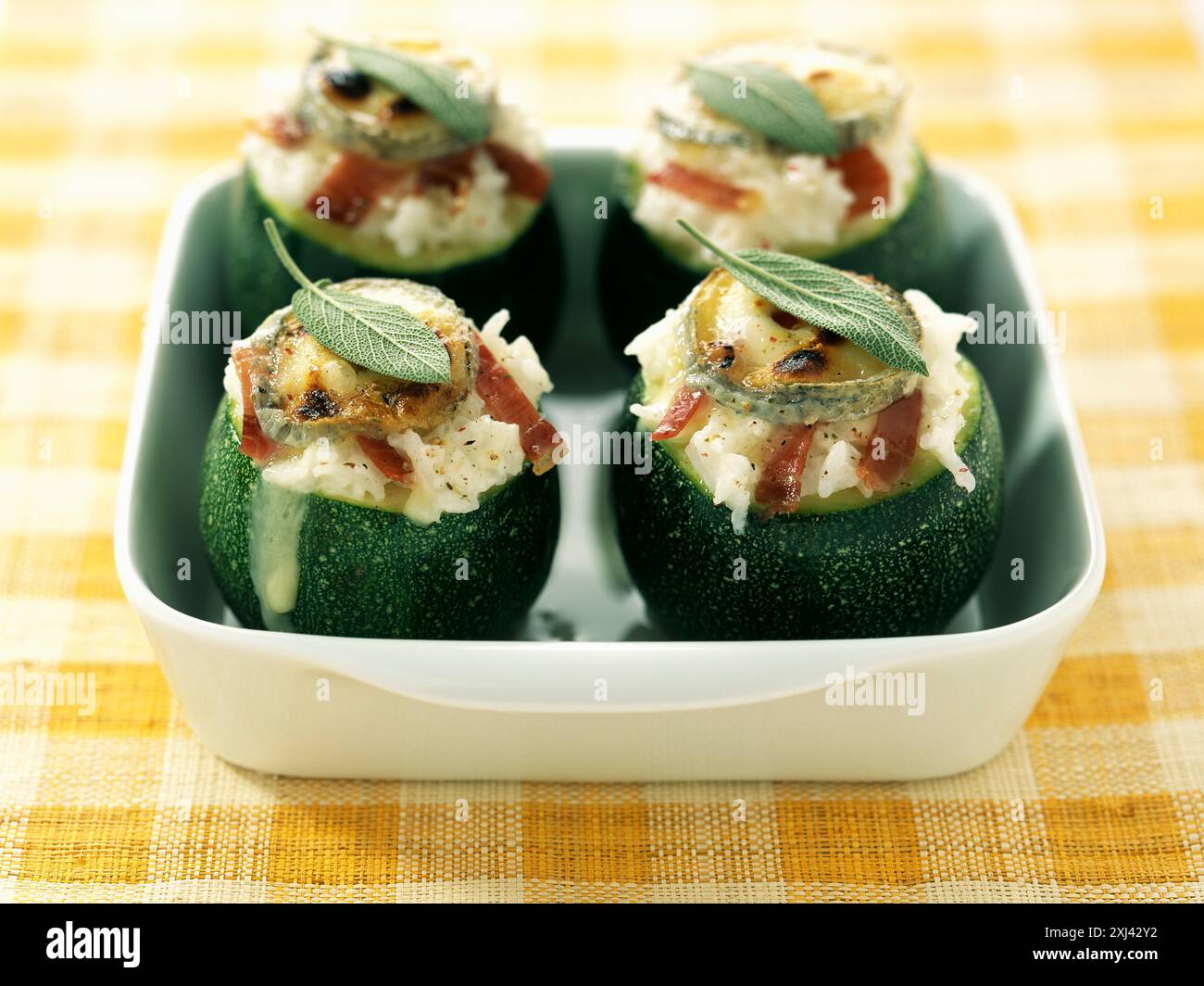 Courgette with goat's cheese and sage Stock Photo - Alamy