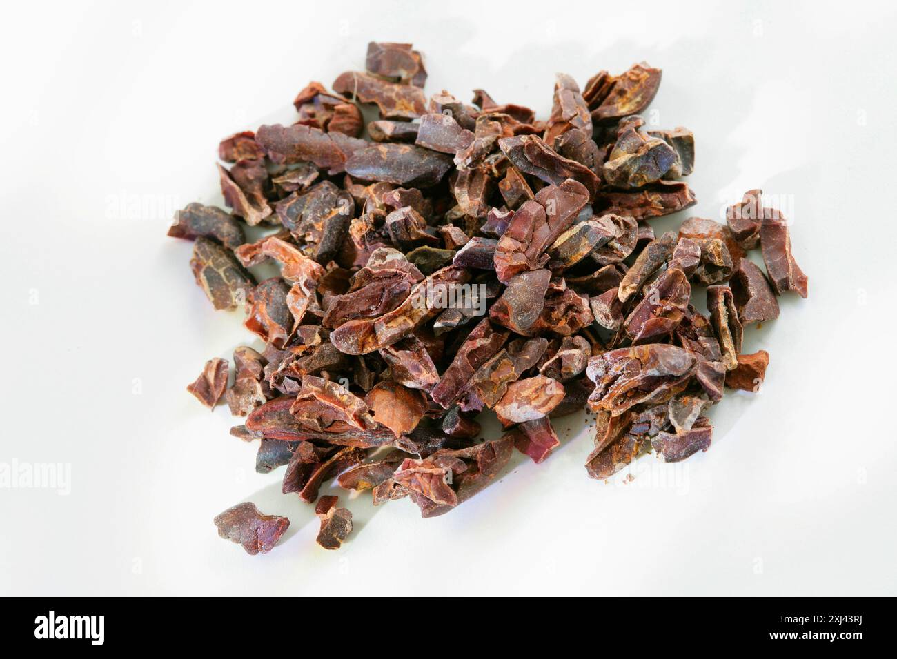 Dried crushed cocoa beans Stock Photo - Alamy
