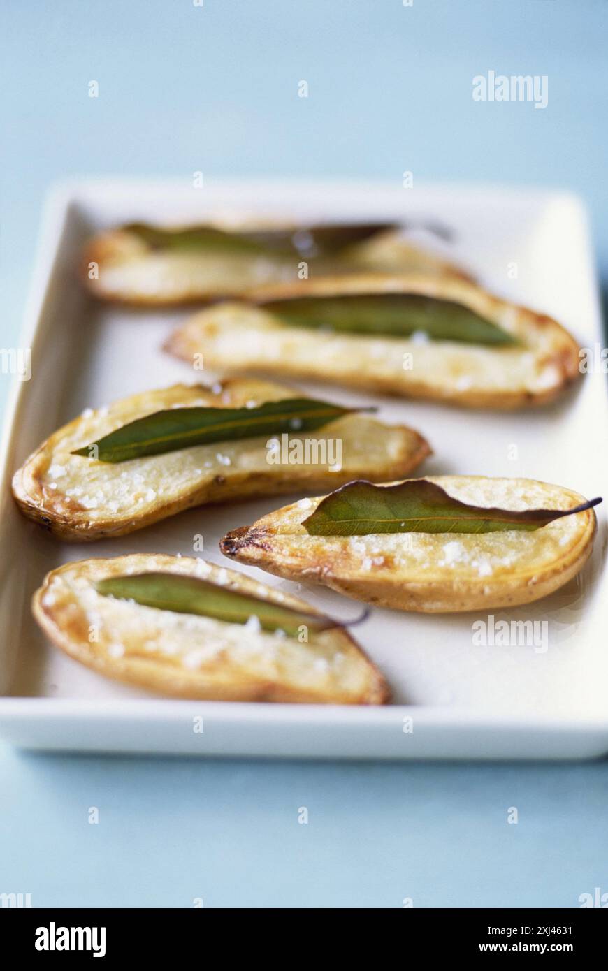 potato puffs with bay leaves Stock Photo - Alamy