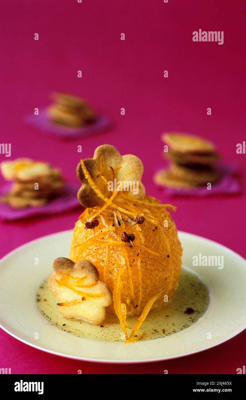 Roasted orange with spices Stock Photo - Alamy