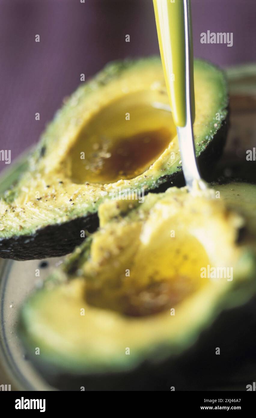 Avocado with French dressing Stock Photo - Alamy
