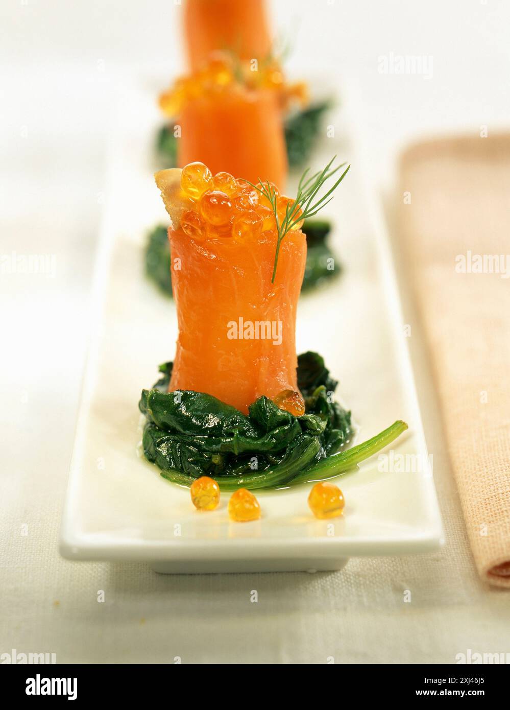 salmon rolls with cod roe and cream cheese,spinach Stock Photo - Alamy
